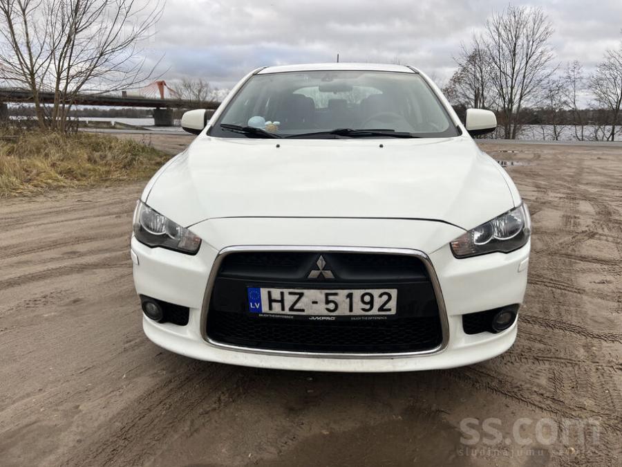 White Mitsubishi Lancer 2012 in Riga, with an engine capacity of 1.80 L and mileage of 217 thousand km for 6000 €, photo 2 on AUTOMOTO.COM.LV
