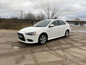 White Mitsubishi Lancer 2012 in Riga, with an engine capacity of 1.80 L and mileage of 217 thousand km for 6000 €, photo 3 on AUTOMOTO.COM.LV