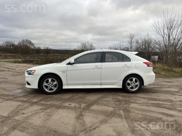 White Mitsubishi Lancer 2012 in Riga, with an engine capacity of 1.80 L and mileage of 217 thousand km for 6000 €, photo 4 on AUTOMOTO.COM.LV