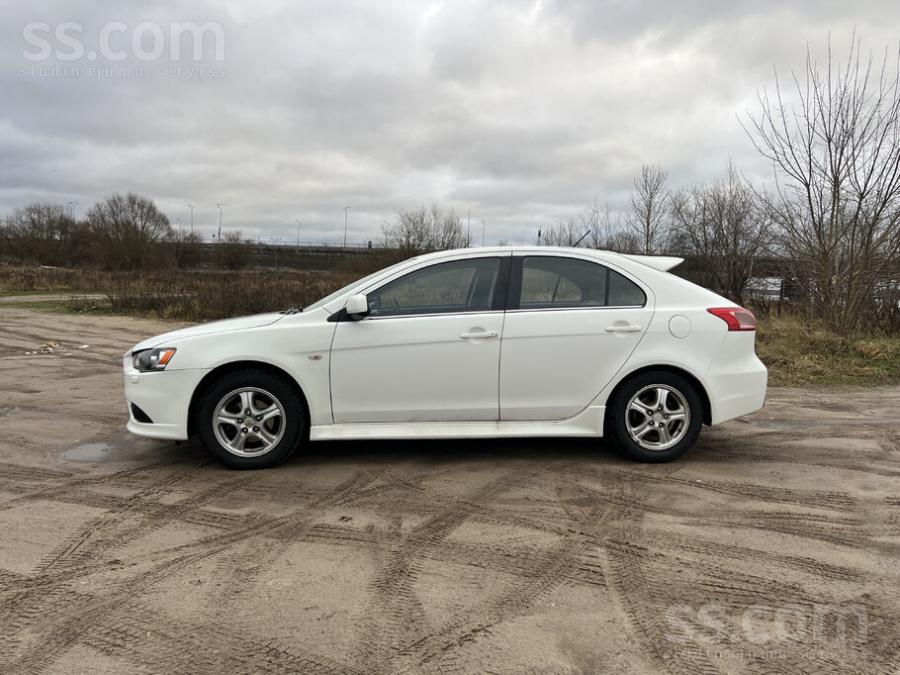White Mitsubishi Lancer 2012 in Riga, with an engine capacity of 1.80 L and mileage of 217 thousand km for 6000 €, photo 4 on AUTOMOTO.COM.LV