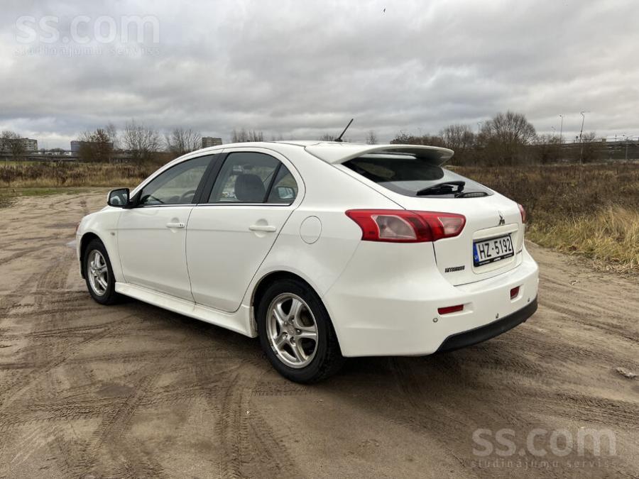 White Mitsubishi Lancer 2012 in Riga, with an engine capacity of 1.80 L and mileage of 217 thousand km for 6000 €, photo 5 on AUTOMOTO.COM.LV
