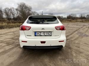 White Mitsubishi Lancer 2012 in Riga, with an engine capacity of 1.80 L and mileage of 217 thousand km for 6000 €, photo 6 on AUTOMOTO.COM.LV