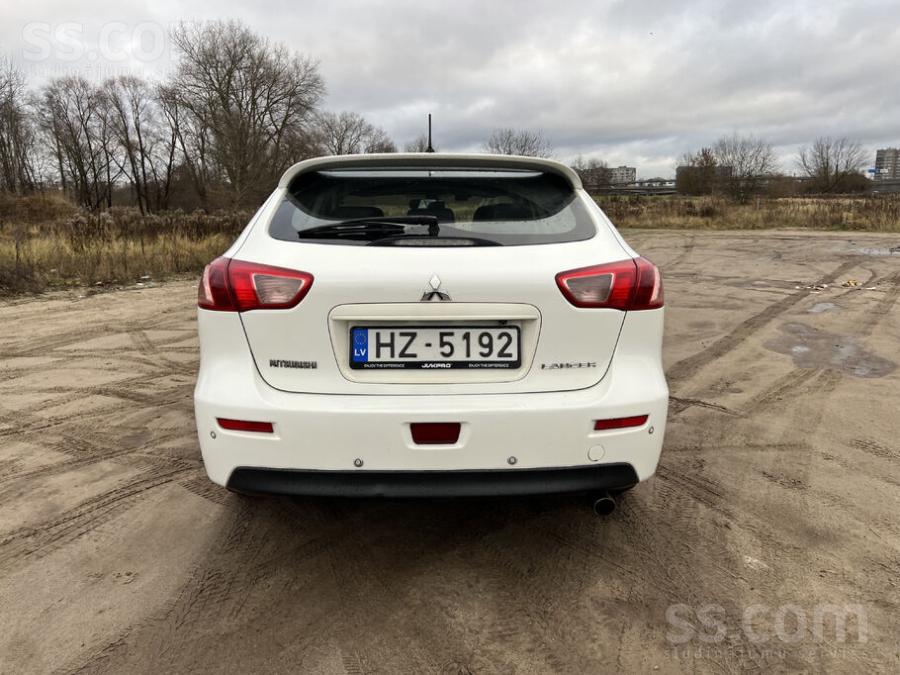 White Mitsubishi Lancer 2012 in Riga, with an engine capacity of 1.80 L and mileage of 217 thousand km for 6000 €, photo 6 on AUTOMOTO.COM.LV
