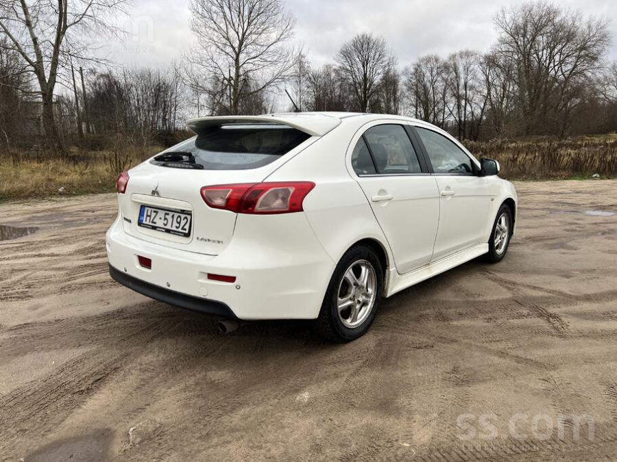White Mitsubishi Lancer 2012 in Riga, with an engine capacity of 1.80 L and mileage of 217 thousand km for 6000 €, photo 7 on AUTOMOTO.COM.LV