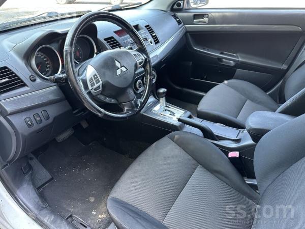 White Mitsubishi Lancer 2008 in Riga, with an engine capacity of 1.80 L and mileage of 0 thousand km for 990 €, photo 6 on AUTOMOTO.COM.LV