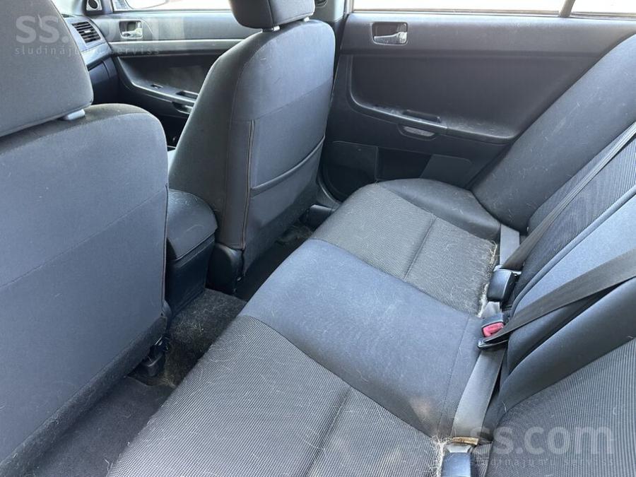 Balts Mitsubishi Lancer 2008 Rīga, ar dzinēja tilpumu 1.80 L un nobraukumu 0 tūkst. km par 990 €, foto 12 vietnē AUTOMOTO.COM.LV