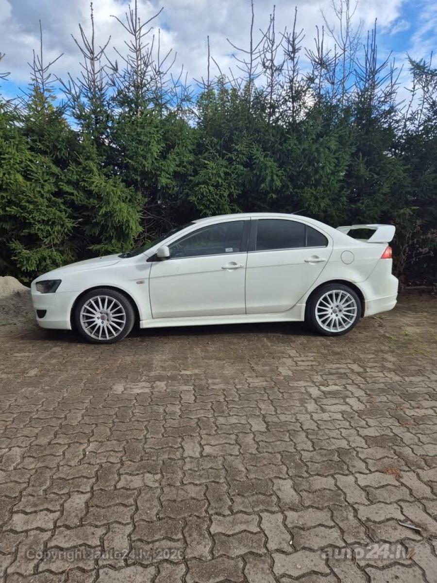Balts Mitsubishi Lancer 2010 Tallina, ar dzinēja tilpumu 1.80 L un nobraukumu 190 tūkst. km par 7100 €, foto 4 vietnē AUTOMOTO.COM.LV