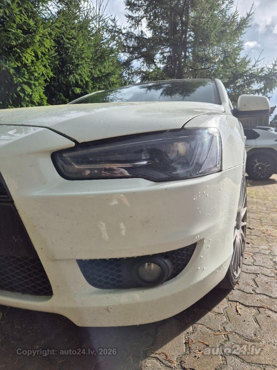 Balts Mitsubishi Lancer 2010 Tallina, ar dzinēja tilpumu 1.80 L un nobraukumu 190 tūkst. km par 7100 €, foto 7 vietnē AUTOMOTO.COM.LV