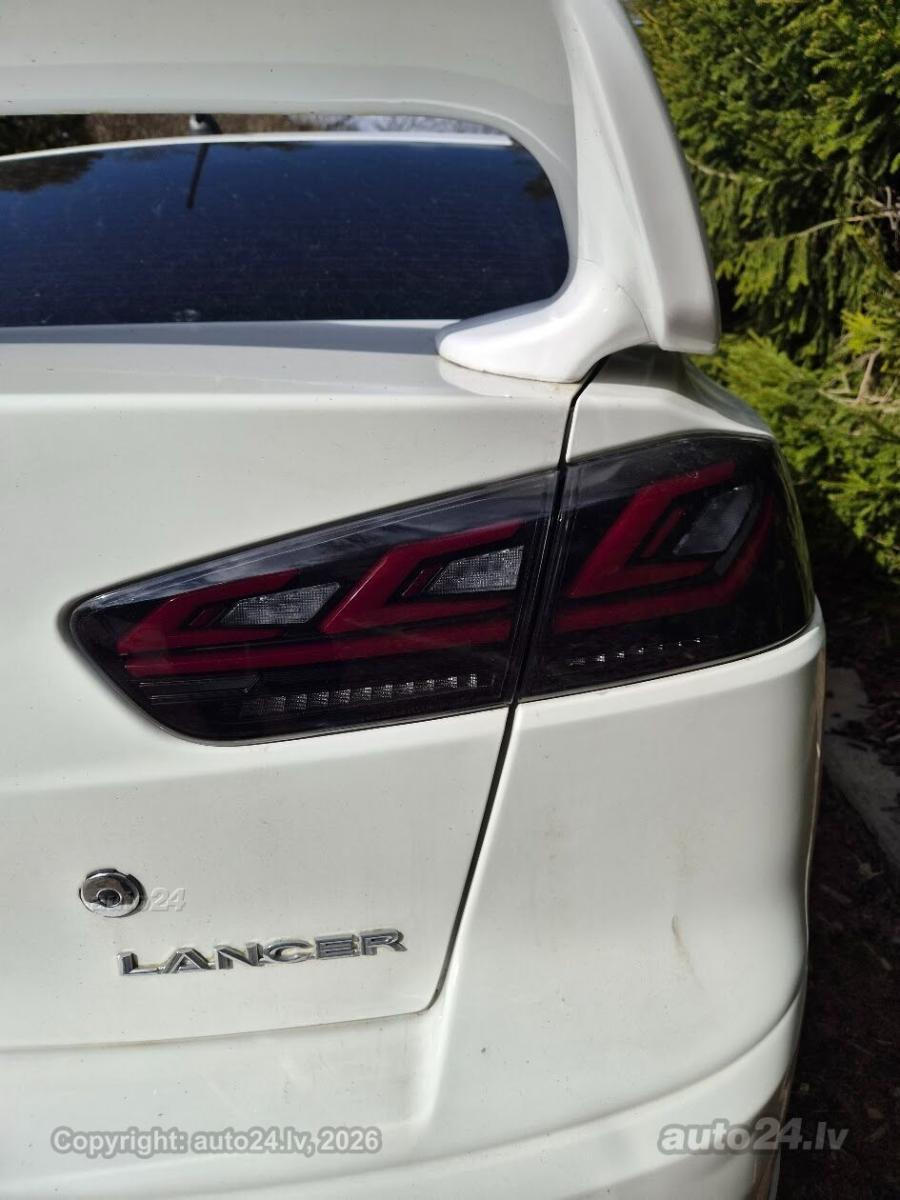 Balts Mitsubishi Lancer 2010 Tallina, ar dzinēja tilpumu 1.80 L un nobraukumu 190 tūkst. km par 7100 €, foto 8 vietnē AUTOMOTO.COM.LV