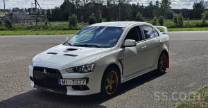Balts Mitsubishi Lancer 2011 Rīga, ar dzinēja tilpumu 2.00 L un nobraukumu 258 tūkst. km par 12500 €, foto  vietnē AUTOMOTO.COM.LV