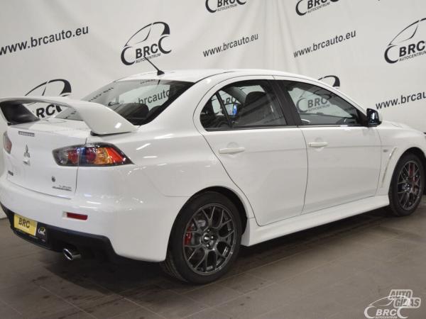 White Mitsubishi Lancer 2014 in Riga, with an engine capacity of 2.00 L and mileage of 117 thousand km for 37400 €, photo 2 on AUTOMOTO.COM.LV