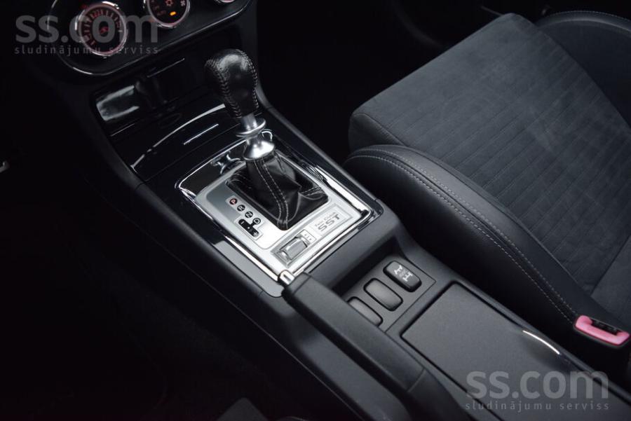 White Mitsubishi Lancer 2014 in Riga, with an engine capacity of 2.00 L and mileage of 117 thousand km for 34900 €, photo 6 on AUTOMOTO.COM.LV