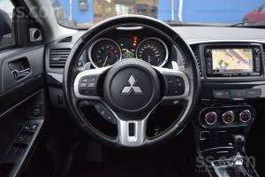 White Mitsubishi Lancer 2014 in Riga, with an engine capacity of 2.00 L and mileage of 117 thousand km for 34900 €, photo 11 on AUTOMOTO.COM.LV
