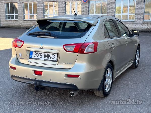 Yellow Mitsubishi Lancer 2010 in Narva, with an engine capacity of 1.80 L and mileage of 153 thousand km for 3999 €, photo 5 on AUTOMOTO.COM.LV