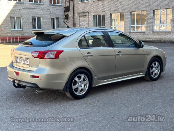 Yellow Mitsubishi Lancer 2010 in Narva, with an engine capacity of 1.80 L and mileage of 153 thousand km for 3999 €, photo 6 on AUTOMOTO.COM.LV