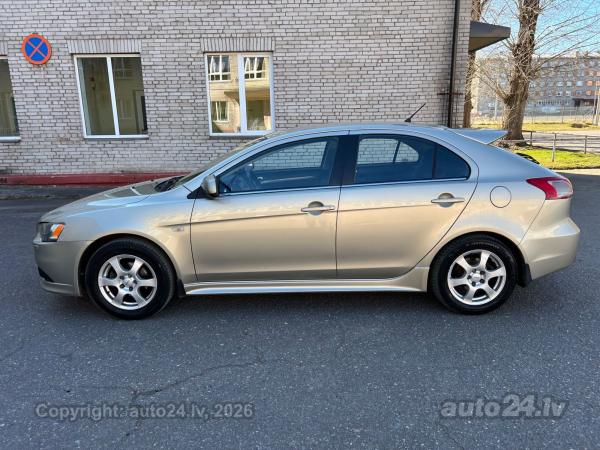 Yellow Mitsubishi Lancer 2010 in Narva, with an engine capacity of 1.80 L and mileage of 153 thousand km for 3999 €, photo 9 on AUTOMOTO.COM.LV