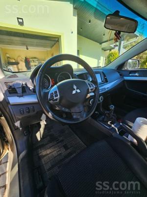 Dzeltens Mitsubishi Lancer 2008 Rīga, ar dzinēja tilpumu 1.90 L un nobraukumu 373 tūkst. km par 1900 €, foto 4 vietnē AUTOMOTO.COM.LV