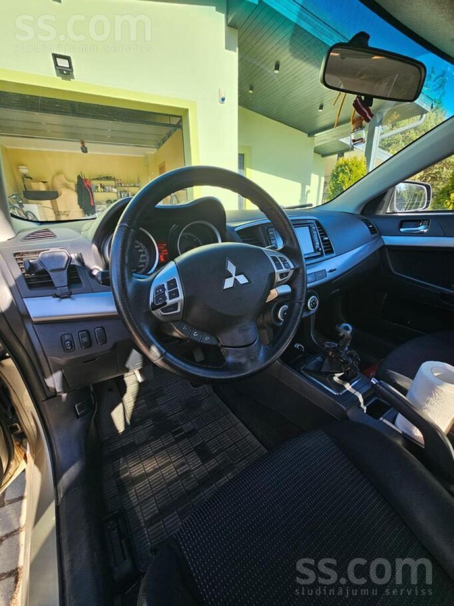 Dzeltens Mitsubishi Lancer 2008 Rīga, ar dzinēja tilpumu 1.90 L un nobraukumu 373 tūkst. km par 1900 €, foto 4 vietnē AUTOMOTO.COM.LV