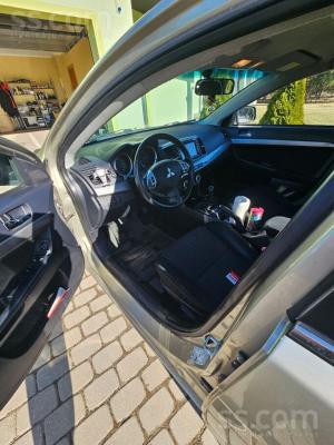 Dzeltens Mitsubishi Lancer 2008 Rīga, ar dzinēja tilpumu 1.90 L un nobraukumu 373 tūkst. km par 1900 €, foto 5 vietnē AUTOMOTO.COM.LV