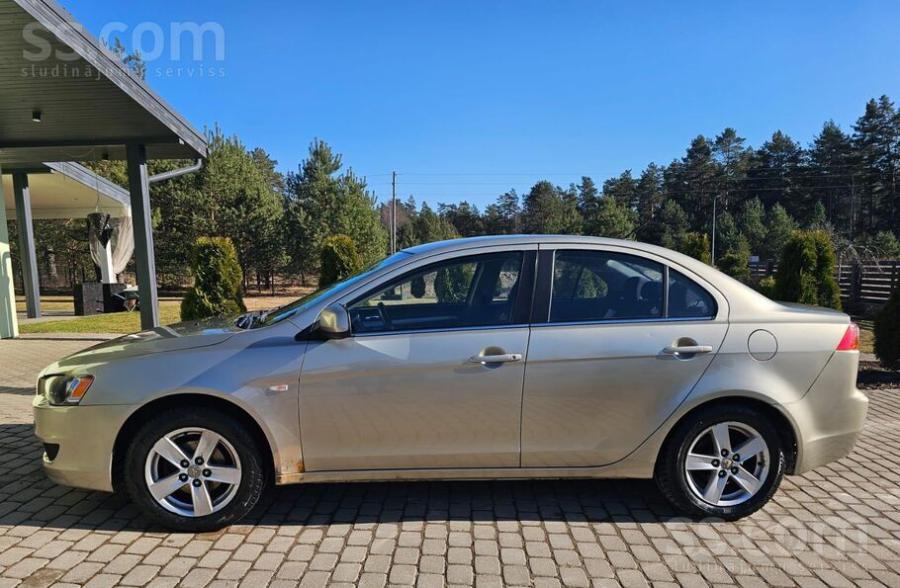 Dzeltens Mitsubishi Lancer 2008 Rīga, ar dzinēja tilpumu 1.90 L un nobraukumu 373 tūkst. km par 1900 €, foto 8 vietnē AUTOMOTO.COM.LV