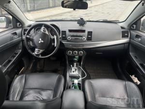 Dzeltens Mitsubishi Lancer 2008 Rīga, ar dzinēja tilpumu 1.80 L un nobraukumu 382 tūkst. km par 2000 €, foto 7 vietnē AUTOMOTO.COM.LV