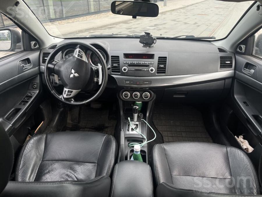Dzeltens Mitsubishi Lancer 2008 Rīga, ar dzinēja tilpumu 1.80 L un nobraukumu 382 tūkst. km par 2000 €, foto 7 vietnē AUTOMOTO.COM.LV