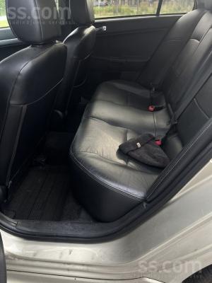Dzeltens Mitsubishi Lancer 2008 Rīga, ar dzinēja tilpumu 1.80 L un nobraukumu 382 tūkst. km par 2000 €, foto 8 vietnē AUTOMOTO.COM.LV