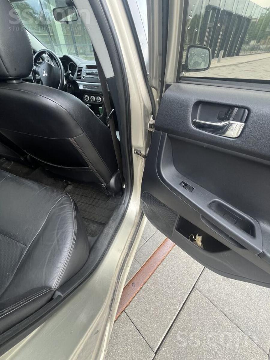 Dzeltens Mitsubishi Lancer 2008 Rīga, ar dzinēja tilpumu 1.80 L un nobraukumu 382 tūkst. km par 2000 €, foto 9 vietnē AUTOMOTO.COM.LV