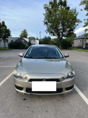 Yellow Mitsubishi Lancer 2008 in Kaunas, with an engine capacity of 1.97 L and mileage of 314 thousand km for 2000 €, photo  on AUTOMOTO.COM.LV
