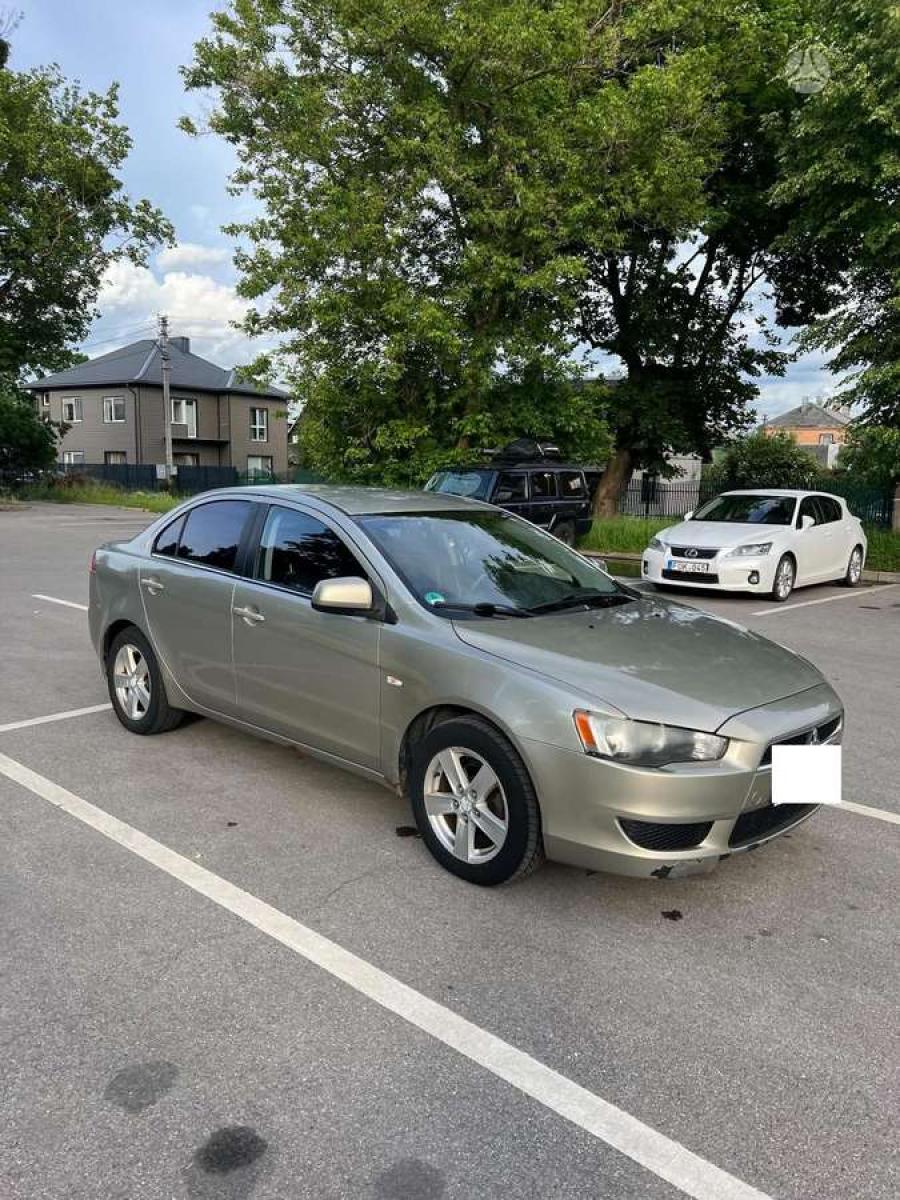 Yellow Mitsubishi Lancer 2008 in Kaunas, with an engine capacity of 1.97 L and mileage of 314 thousand km for 2000 €, photo 3 on AUTOMOTO.COM.LV