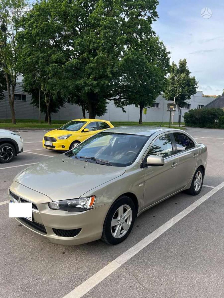 Yellow Mitsubishi Lancer 2008 in Kaunas, with an engine capacity of 1.97 L and mileage of 314 thousand km for 2000 €, photo 4 on AUTOMOTO.COM.LV