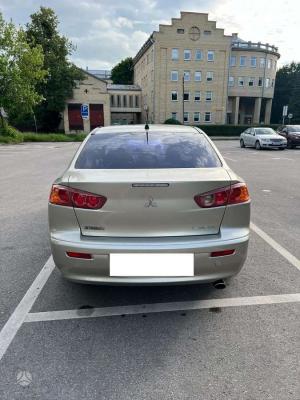 Yellow Mitsubishi Lancer 2008 in Kaunas, with an engine capacity of 1.97 L and mileage of 314 thousand km for 2000 €, photo 5 on AUTOMOTO.COM.LV