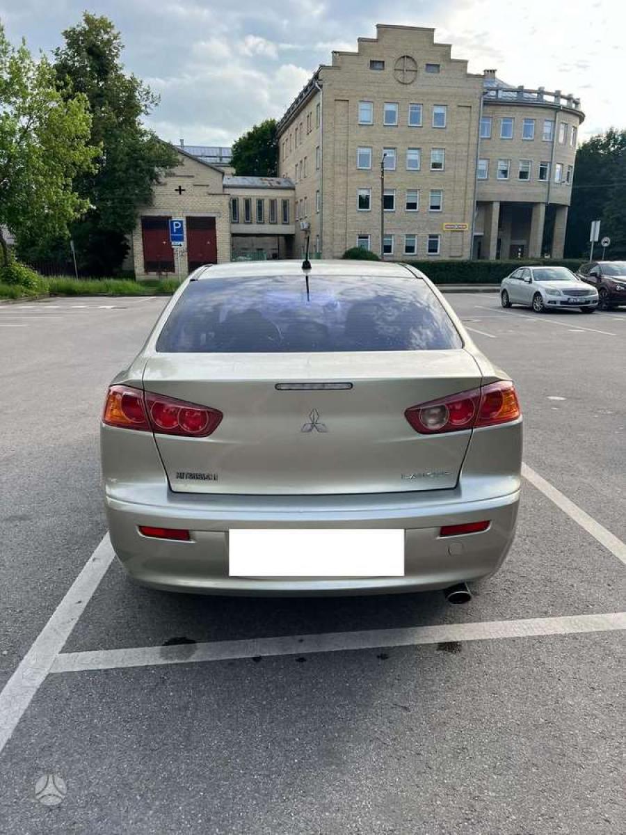 Yellow Mitsubishi Lancer 2008 in Kaunas, with an engine capacity of 1.97 L and mileage of 314 thousand km for 2000 €, photo 5 on AUTOMOTO.COM.LV