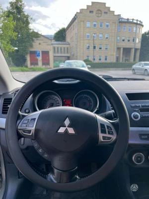 Yellow Mitsubishi Lancer 2008 in Kaunas, with an engine capacity of 1.97 L and mileage of 314 thousand km for 2000 €, photo 6 on AUTOMOTO.COM.LV