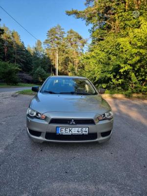 Dzeltens Mitsubishi Lancer 2008 Viļņa, ar dzinēja tilpumu 1.50 L un nobraukumu 124 tūkst. km par 2400 €, foto  vietnē AUTOMOTO.COM.LV