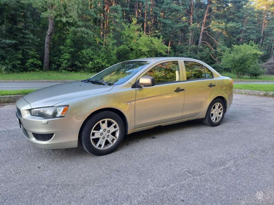 Dzeltens Mitsubishi Lancer 2008 Viļņa, ar dzinēja tilpumu 1.50 L un nobraukumu 124 tūkst. km par 2400 €, foto 3 vietnē AUTOMOTO.COM.LV