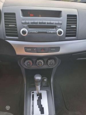 Dzeltens Mitsubishi Lancer 2008 Viļņa, ar dzinēja tilpumu 1.50 L un nobraukumu 124 tūkst. km par 2400 €, foto 8 vietnē AUTOMOTO.COM.LV