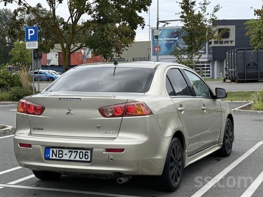 Yellow Mitsubishi Lancer 2008 in Riga, with an engine capacity of 1.80 L and mileage of 380 thousand km for 1600 €, photo 5 on AUTOMOTO.COM.LV