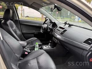 Yellow Mitsubishi Lancer 2008 in Riga, with an engine capacity of 1.80 L and mileage of 380 thousand km for 1600 €, photo 7 on AUTOMOTO.COM.LV