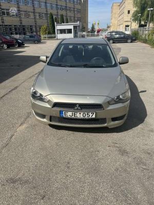 Yellow Mitsubishi Lancer 2009 in Vilnius, with an engine capacity of 1.50 L and mileage of 280 thousand km for 2100 €, photo 5 on AUTOMOTO.COM.LV