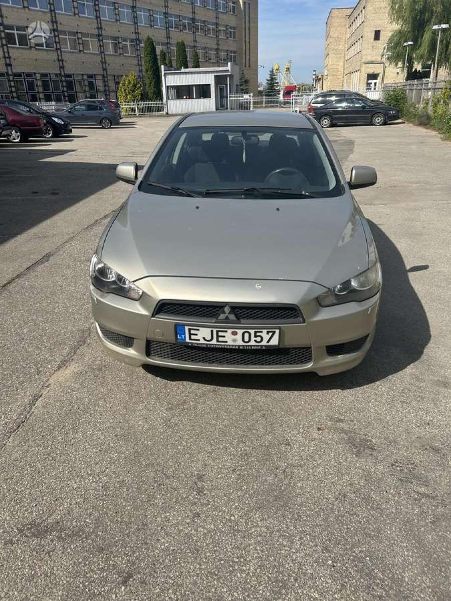 Yellow Mitsubishi Lancer 2009 in Vilnius, with an engine capacity of 1.50 L and mileage of 280 thousand km for 2100 €, photo 5 on AUTOMOTO.COM.LV