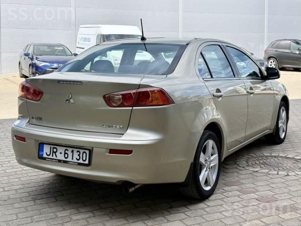 Yellow Mitsubishi Lancer 2010 in Riga, with an engine capacity of 2.00 L and mileage of 369 thousand km for 1490 €, photo 4 on AUTOMOTO.COM.LV