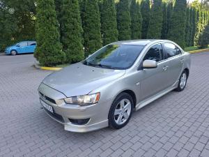 Yellow Mitsubishi Lancer 2011 in Vilnius, with an engine capacity of 1.80 L and mileage of 190 thousand km for 3700 €, photo  on AUTOMOTO.COM.LV