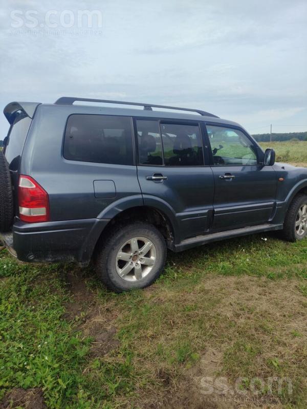 Zils Mitsubishi Montero 2006 Rīga, ar dzinēja tilpumu 3.80 L un nobraukumu 172 tūkst. km par 4200 €, foto 8 vietnē AUTOMOTO.COM.LV