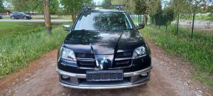 Melns Mitsubishi Outlander 2003 Viļņa, ar dzinēja tilpumu 2.00 L un nobraukumu 128 tūkst. km par 3950 €, foto  vietnē AUTOMOTO.COM.LV
