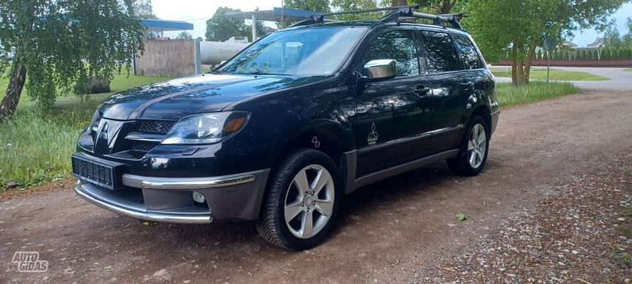 Melns Mitsubishi Outlander 2003 Viļņa, ar dzinēja tilpumu 2.00 L un nobraukumu 128 tūkst. km par 3950 €, foto 3 vietnē AUTOMOTO.COM.LV