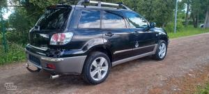 Melns Mitsubishi Outlander 2003 Viļņa, ar dzinēja tilpumu 2.00 L un nobraukumu 128 tūkst. km par 3950 €, foto 4 vietnē AUTOMOTO.COM.LV