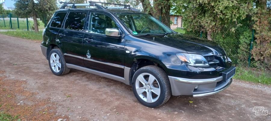Melns Mitsubishi Outlander 2003 Viļņa, ar dzinēja tilpumu 2.00 L un nobraukumu 128 tūkst. km par 3950 €, foto 5 vietnē AUTOMOTO.COM.LV