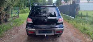 Melns Mitsubishi Outlander 2003 Viļņa, ar dzinēja tilpumu 2.00 L un nobraukumu 128 tūkst. km par 3950 €, foto 7 vietnē AUTOMOTO.COM.LV