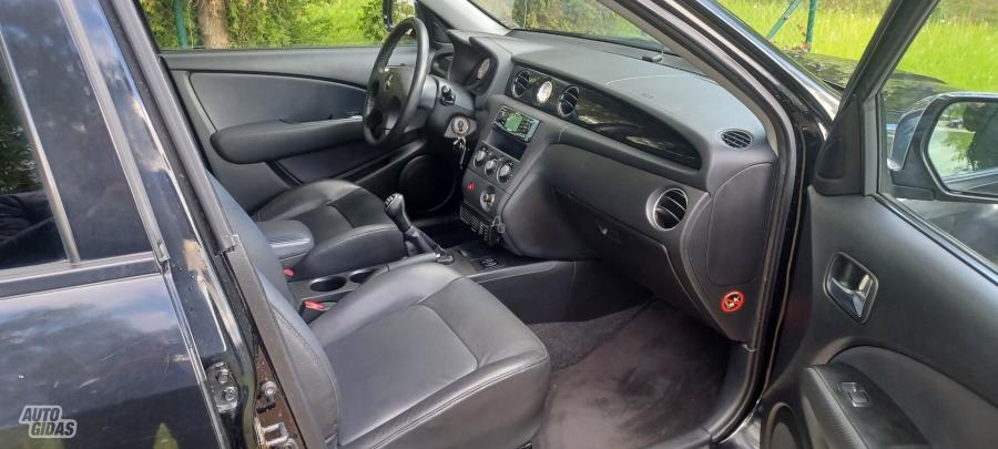 Melns Mitsubishi Outlander 2003 Viļņa, ar dzinēja tilpumu 2.00 L un nobraukumu 128 tūkst. km par 3950 €, foto 13 vietnē AUTOMOTO.COM.LV
